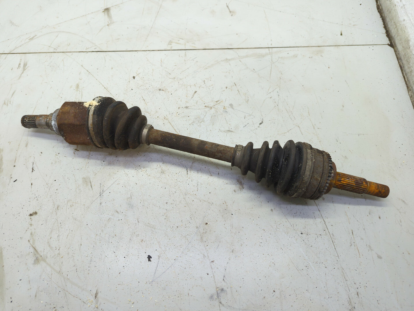 Полуось (вал, шрус) левая передняя Toyota Corolla E12 Б/У