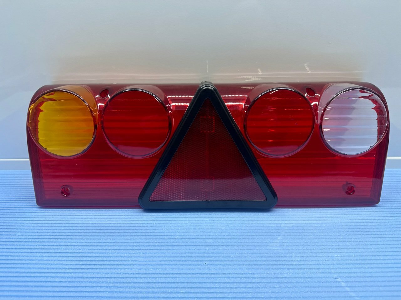 Стекло фонаря заднего прицепа SCHMITZ (шмитц) левое ABS пластик