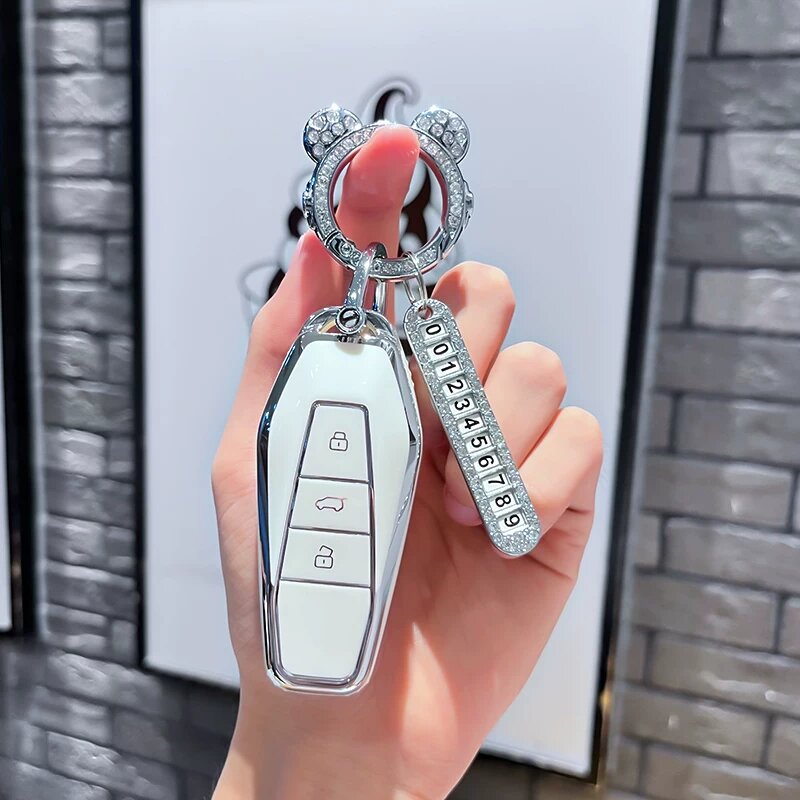 Чехол для ключей Chery iCAR03 2024 с белой оболочкой, космическим замком и серебряной биркой
