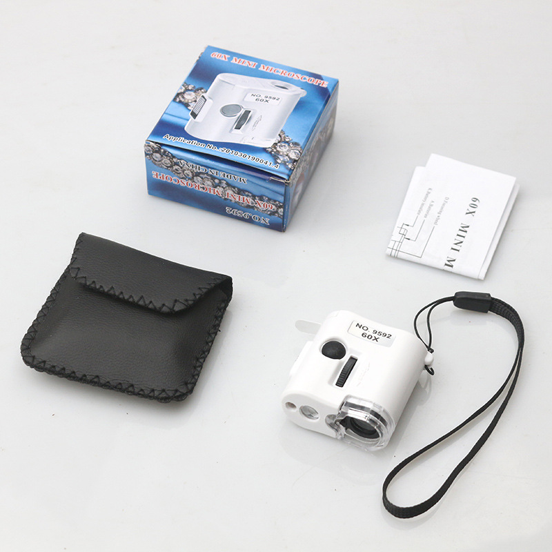 Микроскоп карманный 60x со светодиодной и ультрафиолетовой подсветкой.