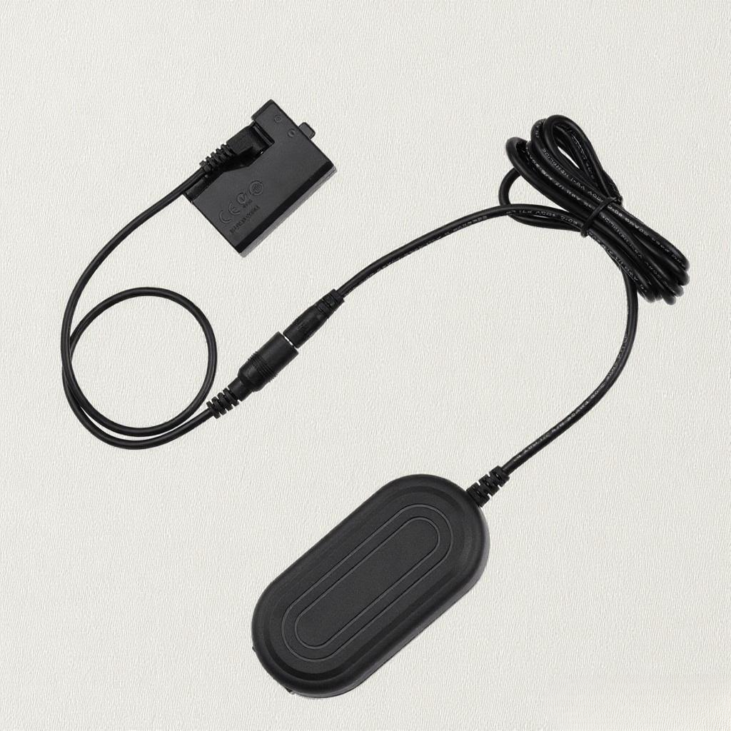 ACK-E10 Адаптер питания AC Клемма имитационная батарейка Зарядное устройство Набор (Замена для LP-E10) Совместимый с Canon Rebel T3/T5/T6/T7/T100/Kiss X50/Kiss X70/1100D/1200D/1300D/2000D/4000D Вход 100-240V Выход 8V 3A В комплект входят 1