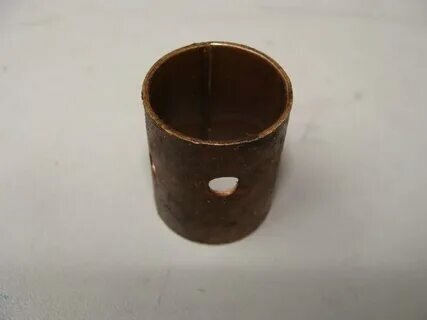 Втулка шатуна Москвич дв. Узам (разрезная, 2 отверстия) 1 шт