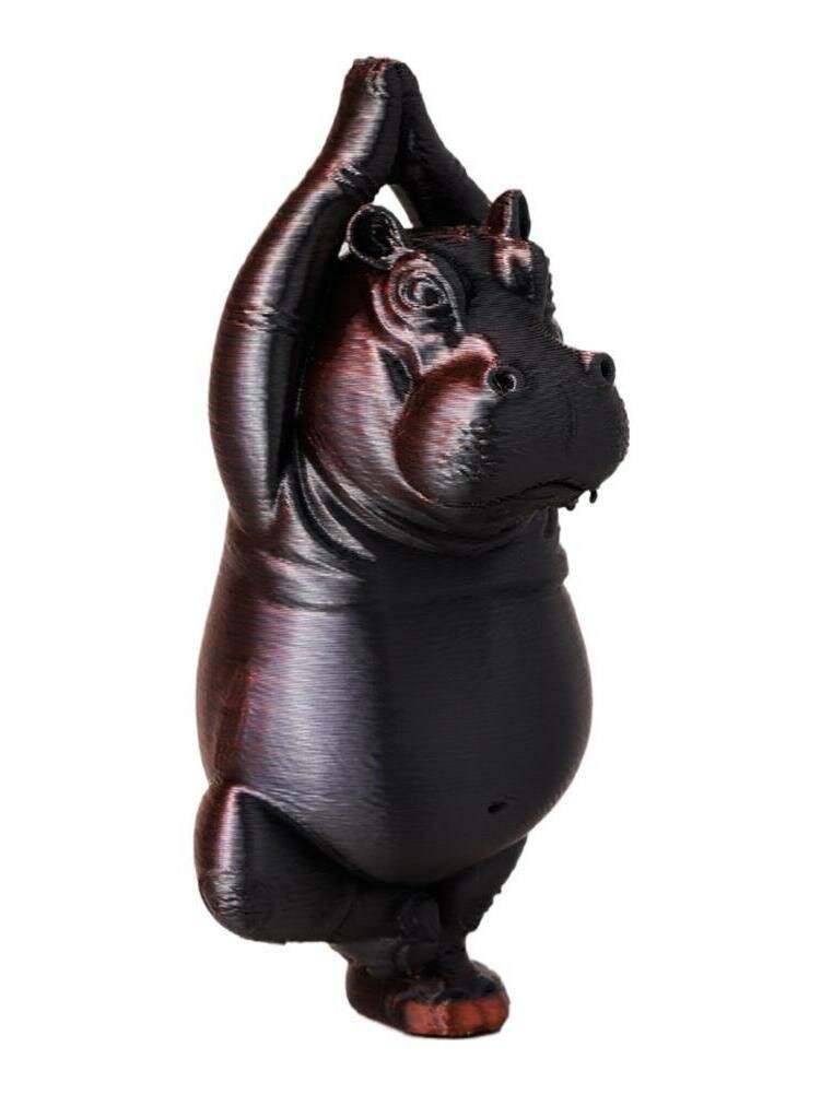 Симпатичная декоративная статуэтка бегемота