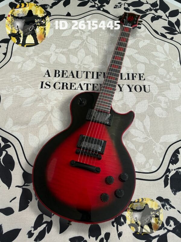 Электрогитара Gibson Les Paul с 6 струнами, длина корпуса 39 дюймов.