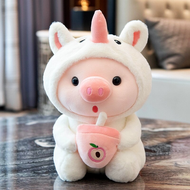 Милая плюшевая игрушка в виде свиньи, пьющей молочный чай, трансформируется в плюшевую игрушку в виде кролика,