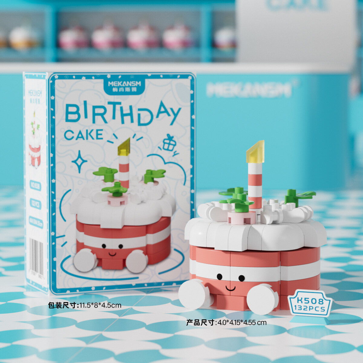 Новый тортик «Маккензи» — милое украшение для рабочего стола, выполненное из крошечных строительных блоков и украшенное изображением шоколадного торта.