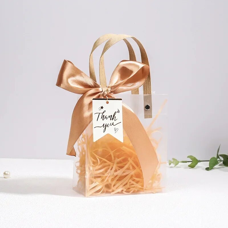 Прозрачные подарочные пакеты из ПВХ с розовой лентой champagne