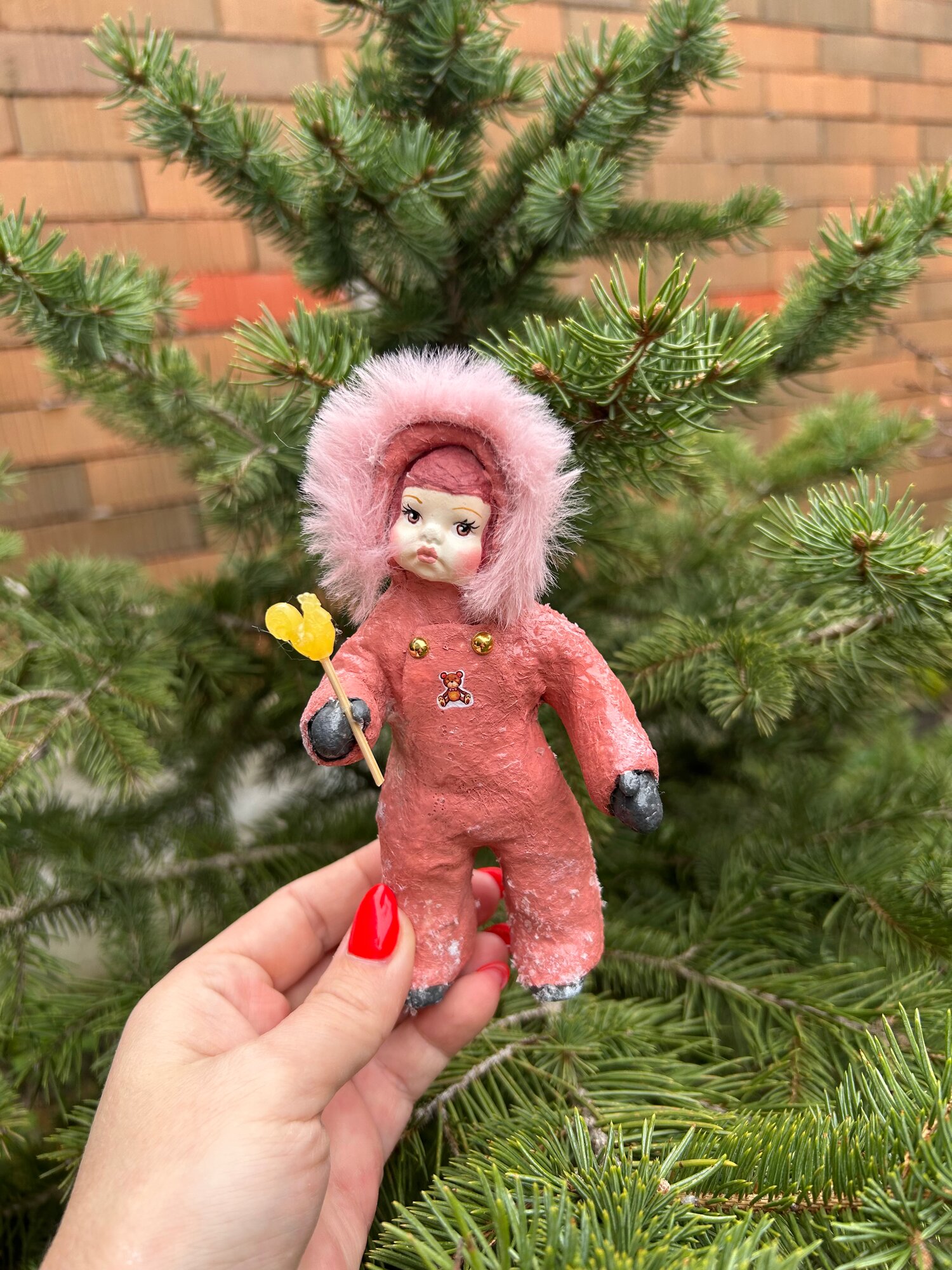 Ватная елочная игрушка - малышка в комбинезоне