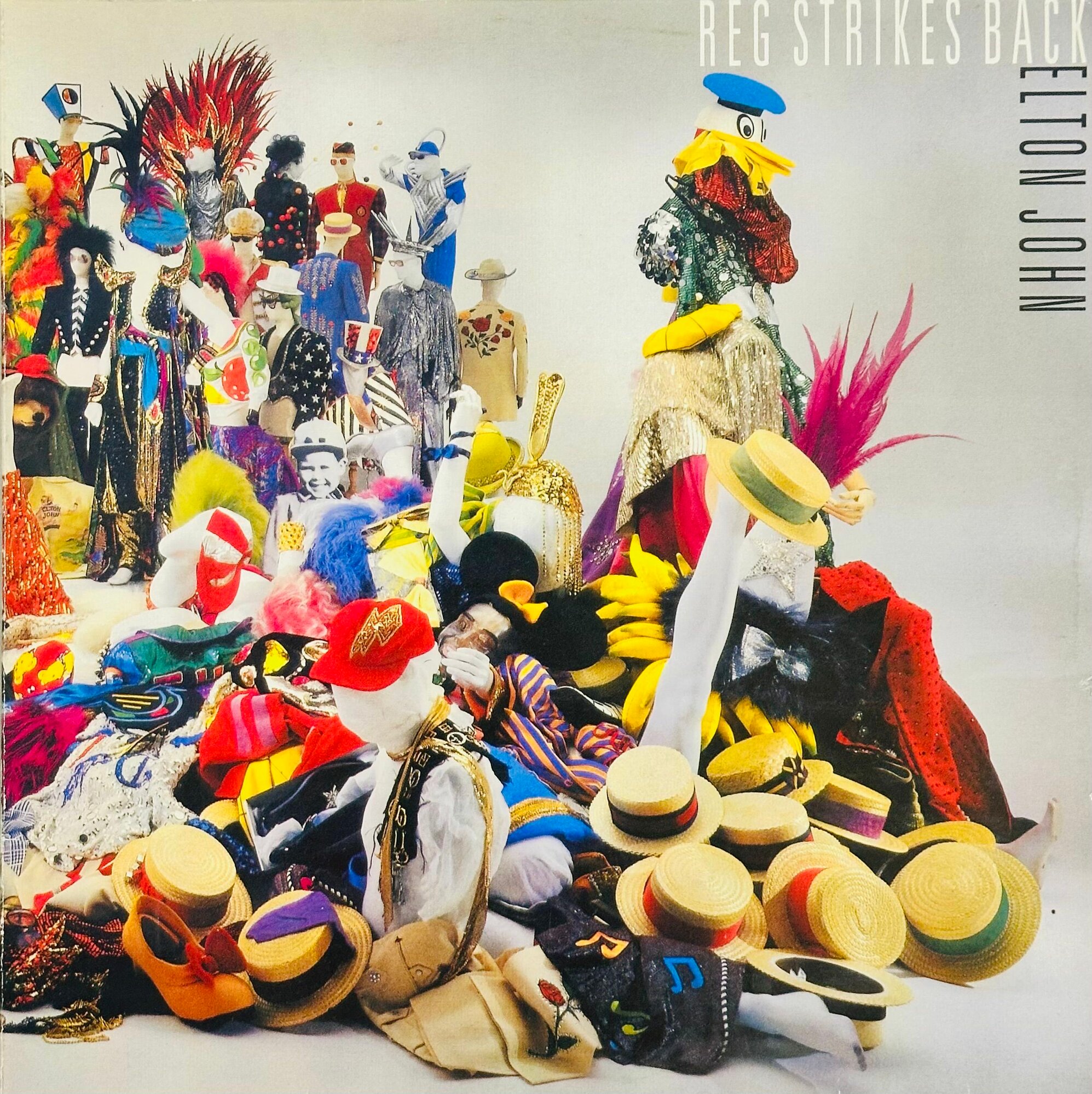 Elton John "Reg Strikes Back", винил LP12" 1988 Yugoslavia