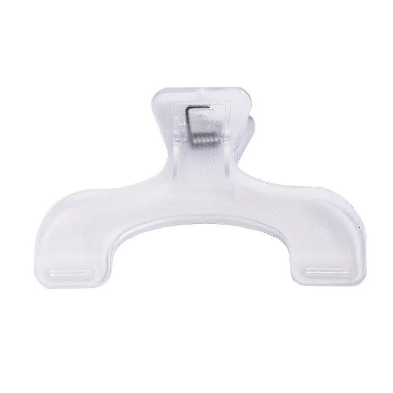 Прозрачный зажим для книг