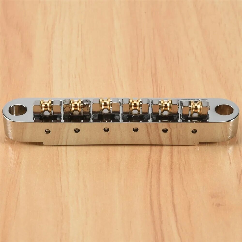 Серебряная электрическая гитара Roller Saddle Bridge Lp