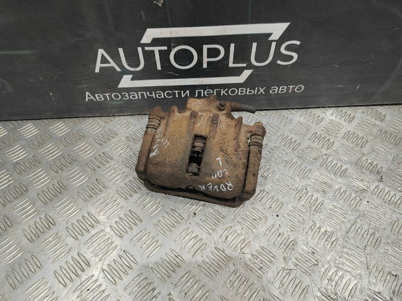 Суппорт тормозной Левый Передний Rover 214 1998 (14K4F) Б/У с пробегом Арт. SEG100180