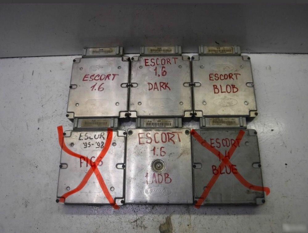 Блок управления двигателем Ford Escort 98AB12A650BDB
