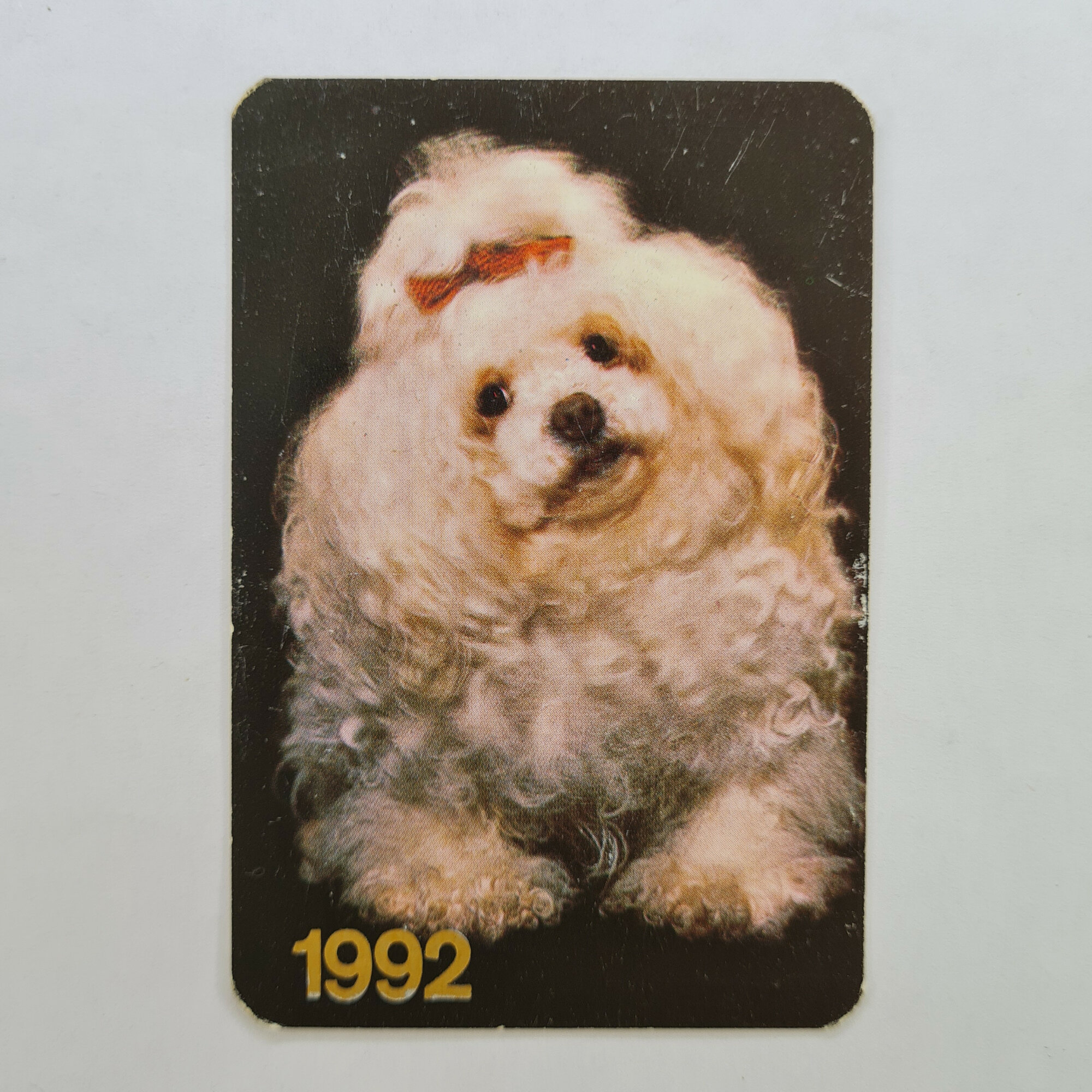Карманный календарик 1992. Собака с бантом, домашние животные. Календарь винтажный