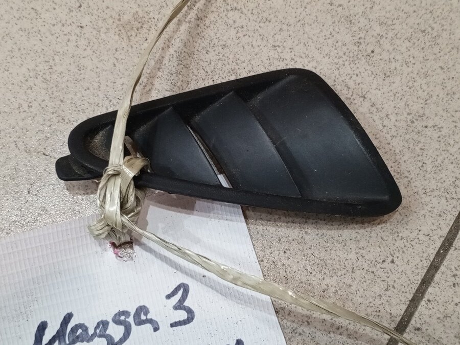 Дефлектор воздушный левый от Mazda 3 bk 2003-2009