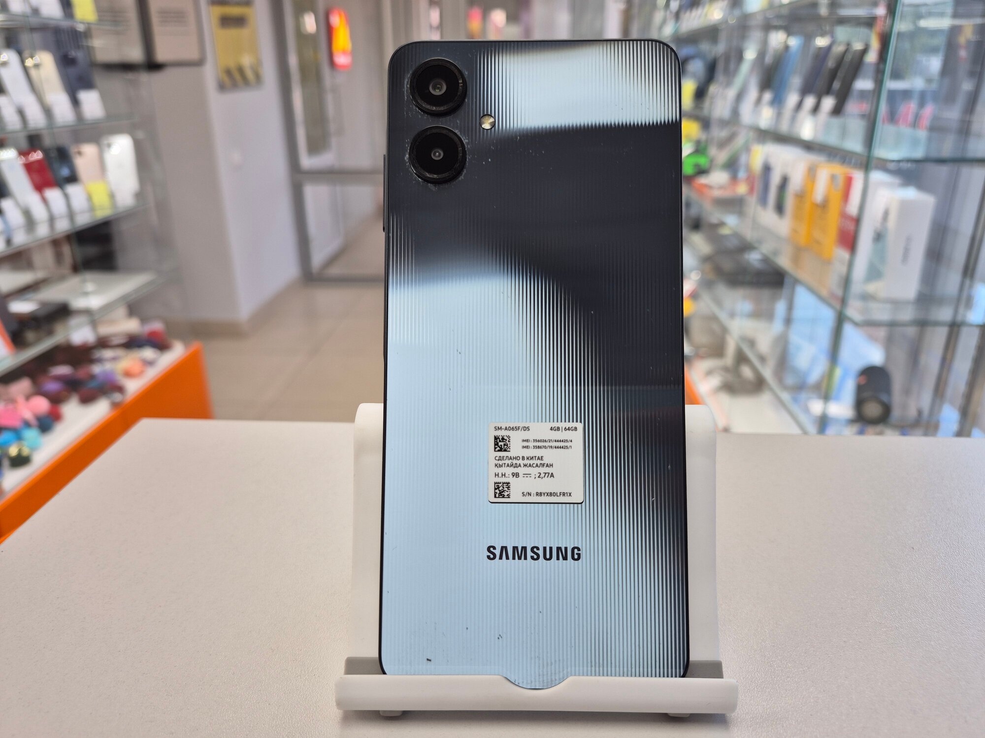 Смартфон Samsung Galaxy A06 Ростест, 6.7", 2 камеры, 4/64Гб, черный, Б/У, Уценка