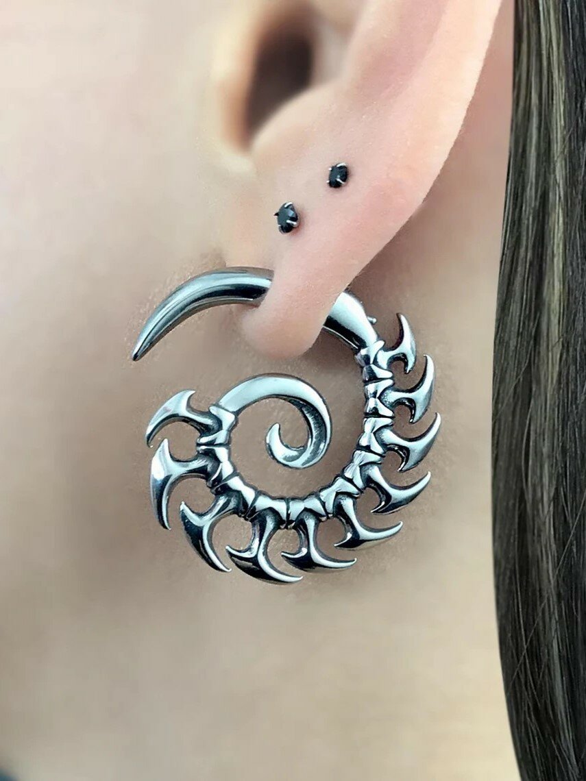 Моносерьга, славянский оберег