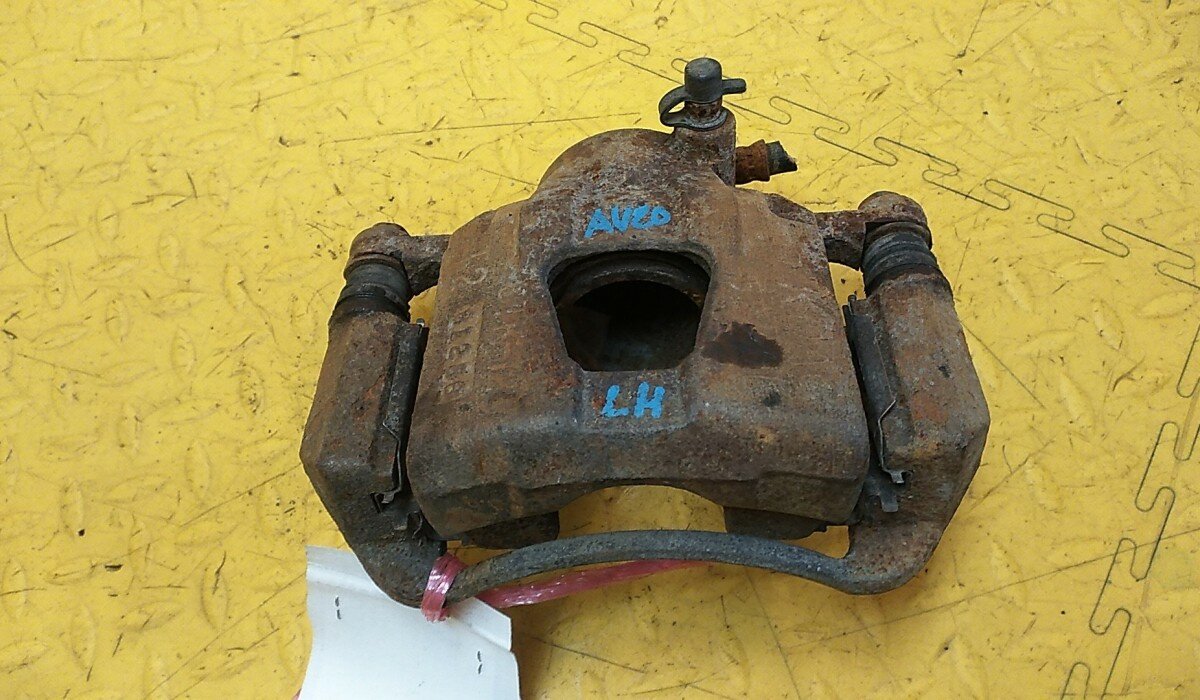 Суппорт передний Aveo (T250) Chevrolet 96534637