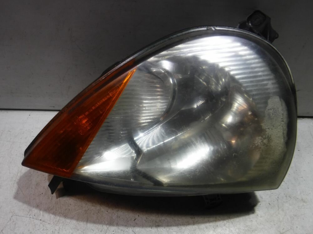 Фара левая Ford KA 1079425