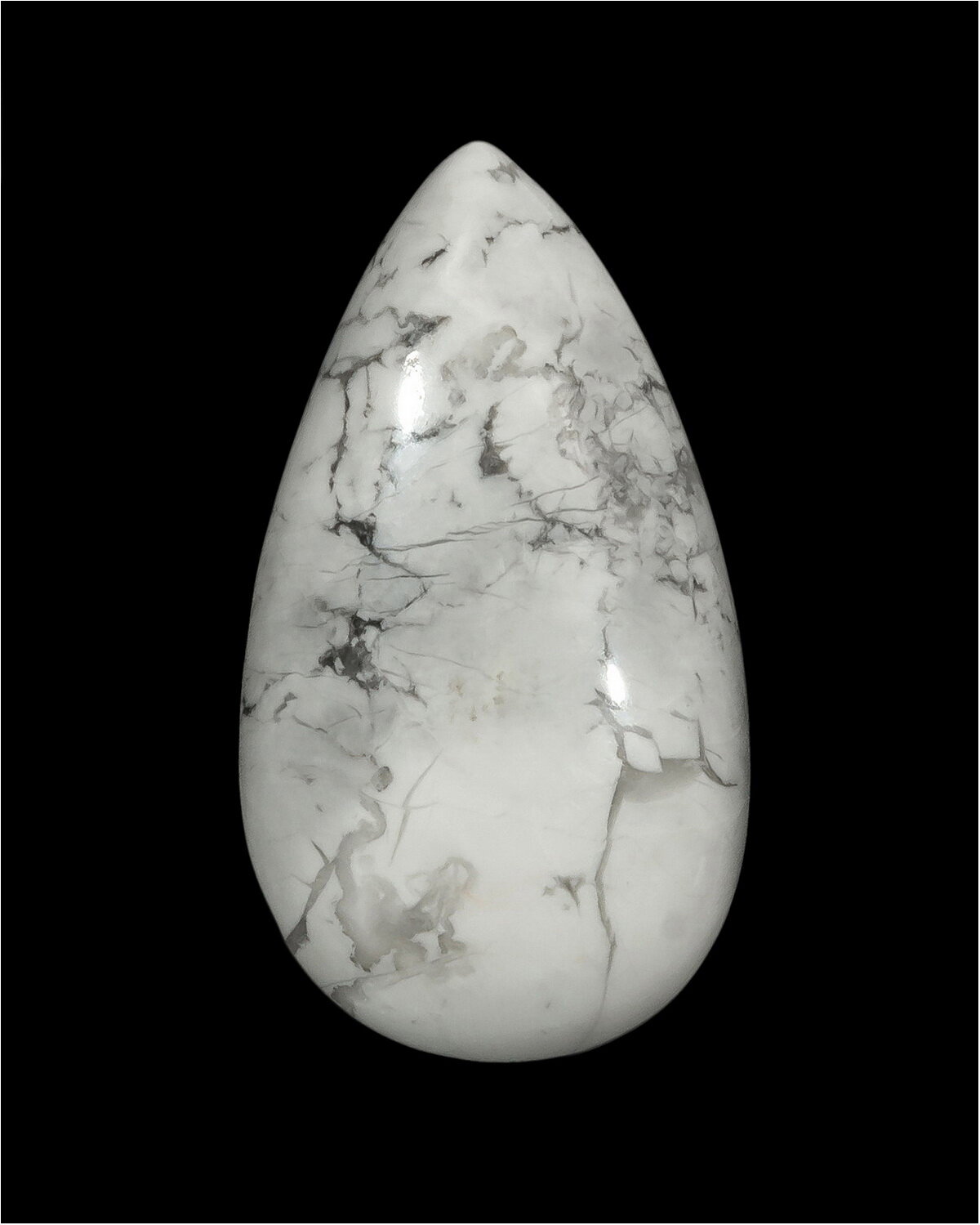 Магнезит, кабошон из минерала, размер: 40х22х6 мм, натуральный камень.