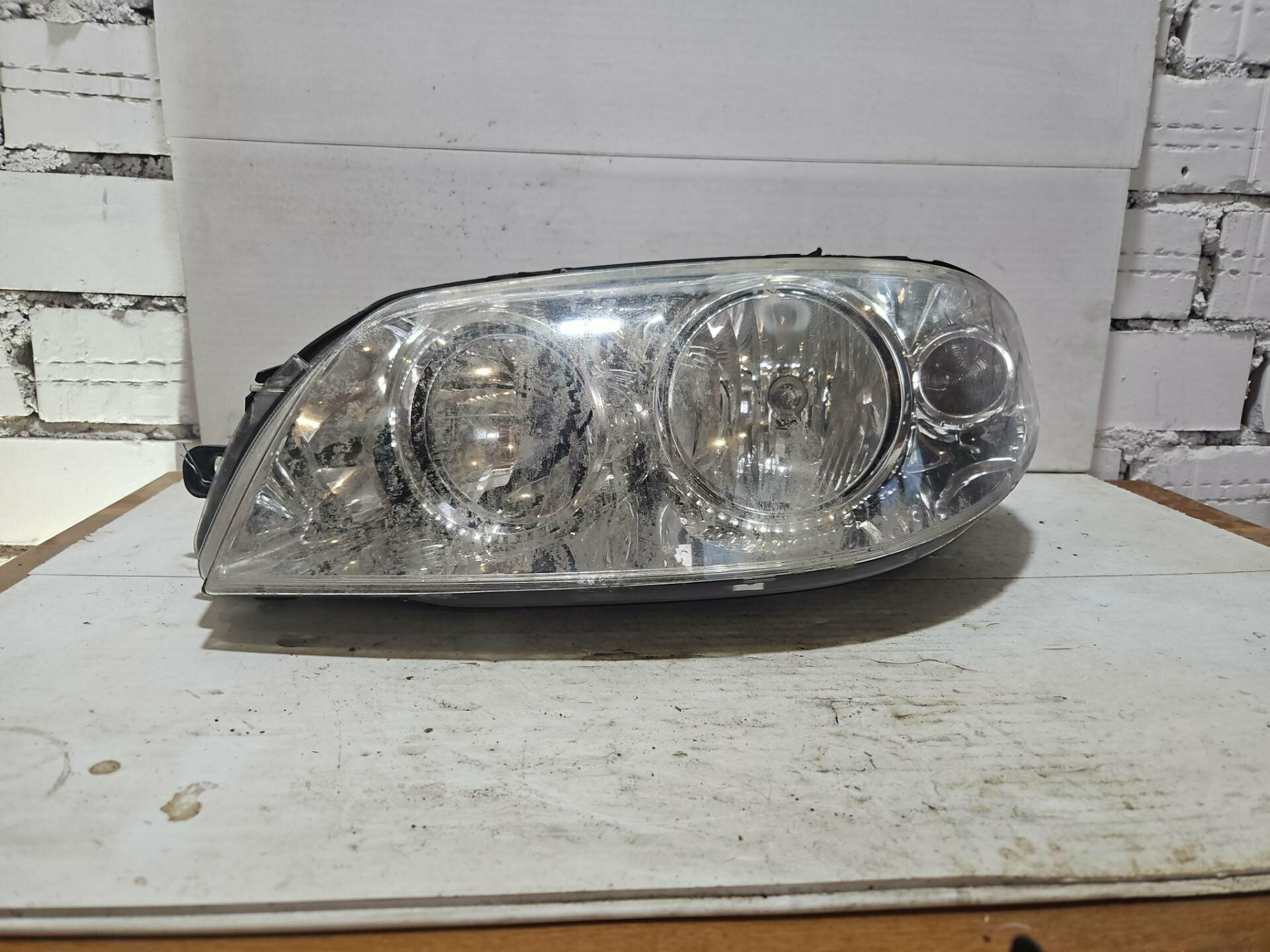 Фара левая Fiat Punto 2 рест. 2004