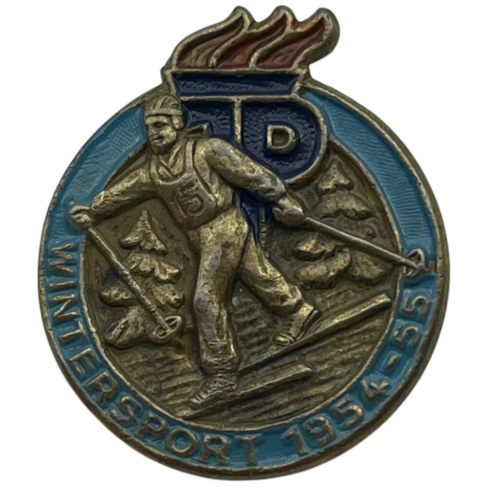 Знак "Зимние виды спорта. Сезон 1954-55" серебряная ст. ГДР 1955 г.