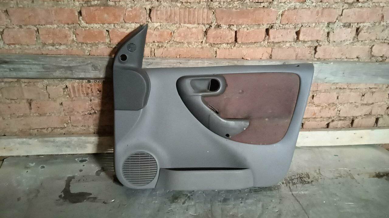 Обшивка двери передней правой Opel Corsa C 2002 09116450RH