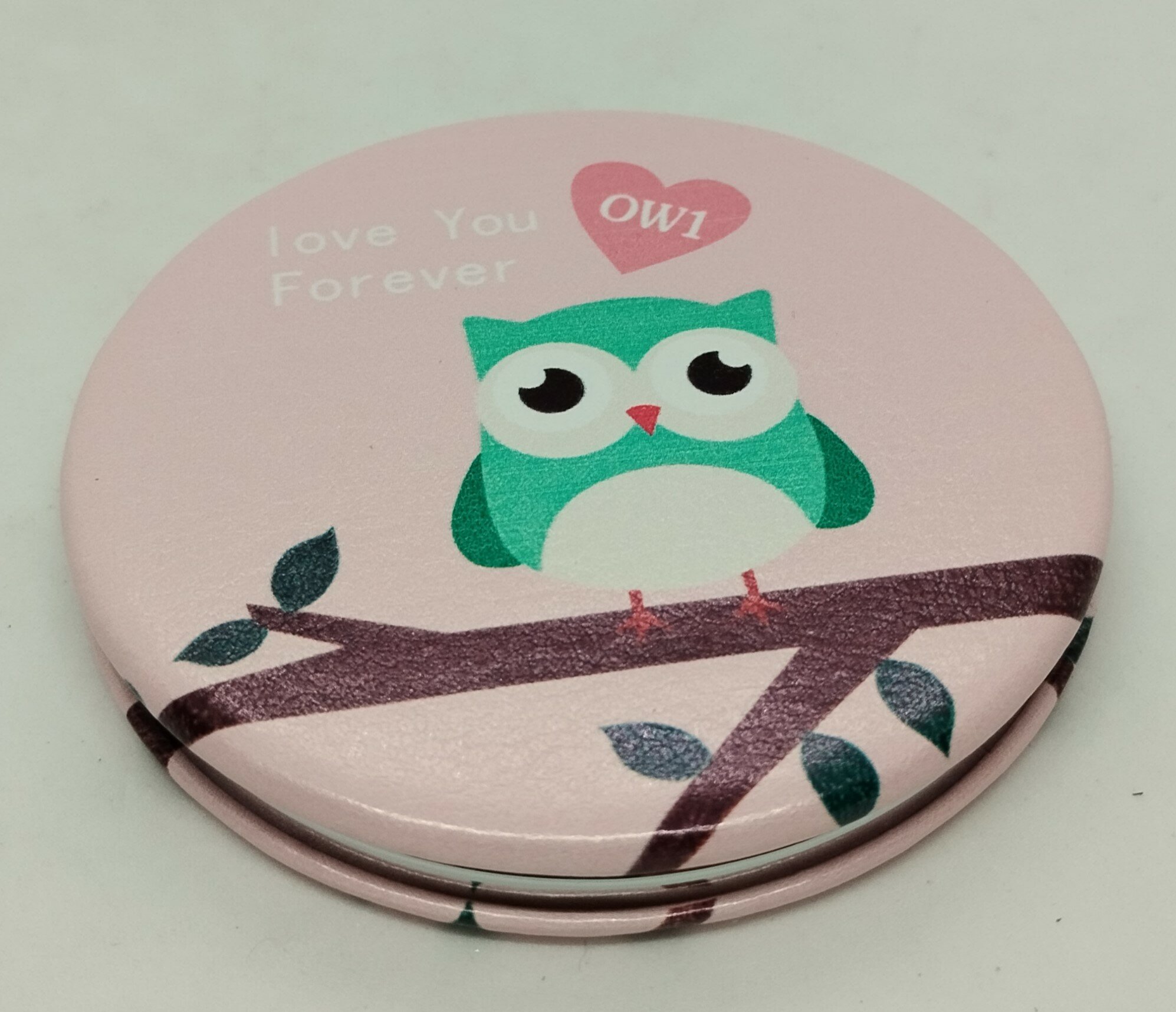 Зеркало кожаное, круглое "Зеленая сова на ветке"