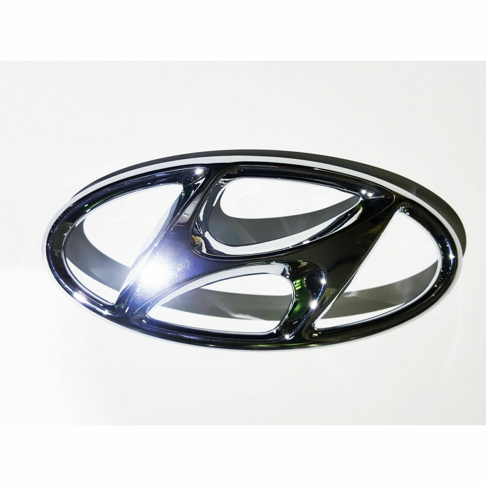 Эмблема передняя оригинал Hyundai Accent Elantra Sonata 98мм x 50мм OEM 8634139000