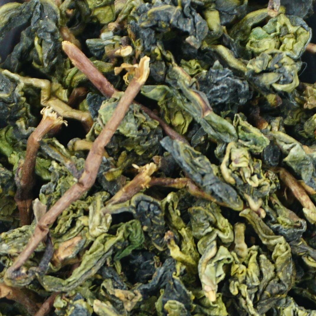 Те Гуань Инь Гандэ Мао Ча (с веточками)