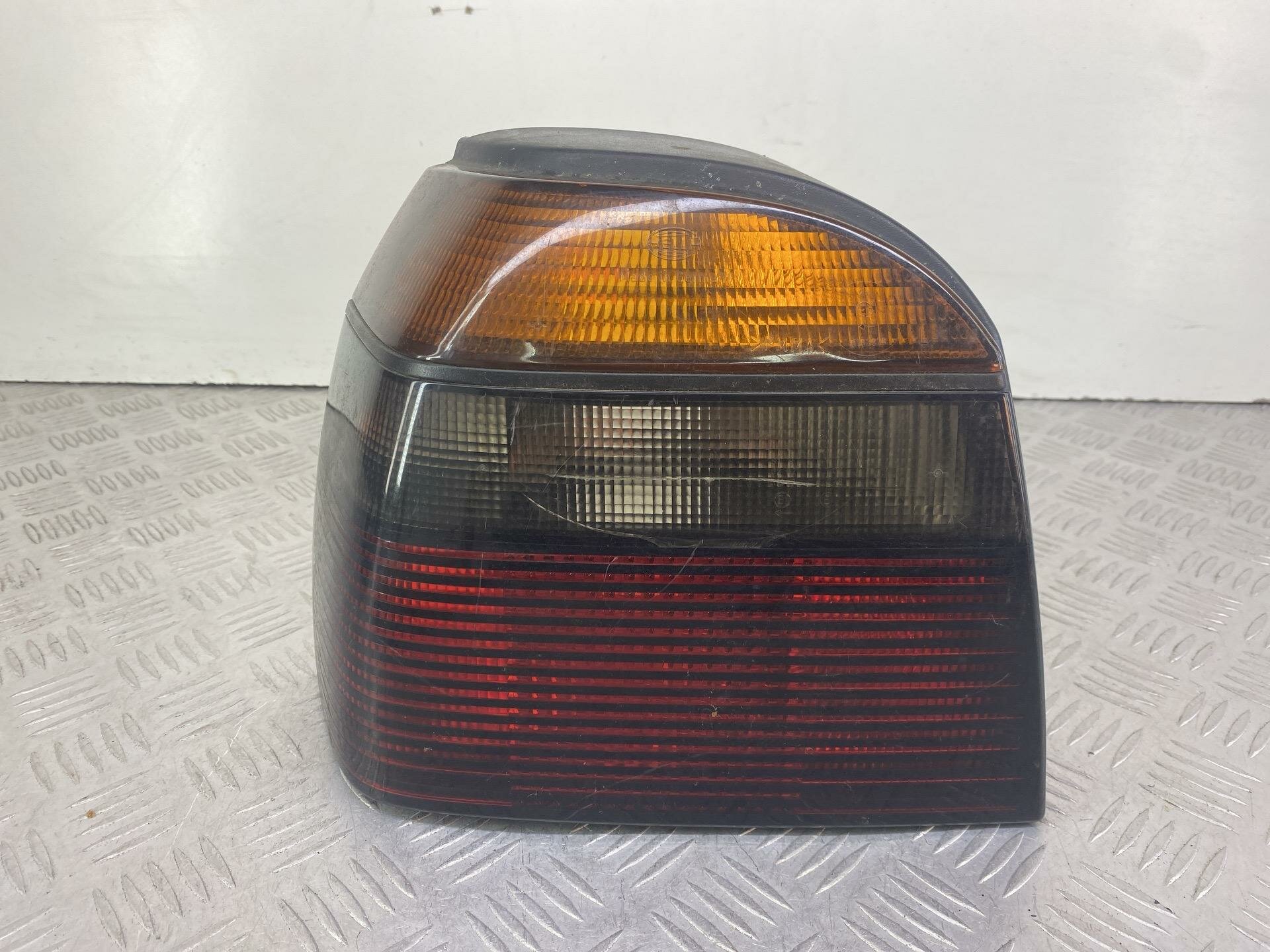 Фонарь задний левый Volkswagen Golf 3 1999 1E0945111
