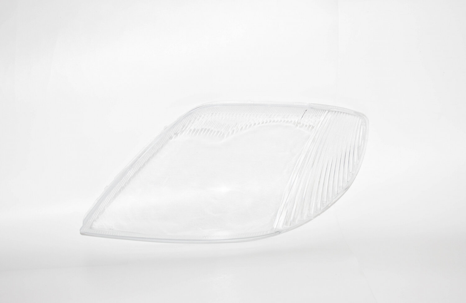 Стекло фары TOYOTA COROLLA 120 2 отражателя (2000-2006) (левое)