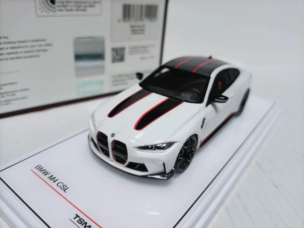 Коллекционная модель тюнинг-купе BMW M4 CSL в цвете Альпийский белый , масштаб 1:43