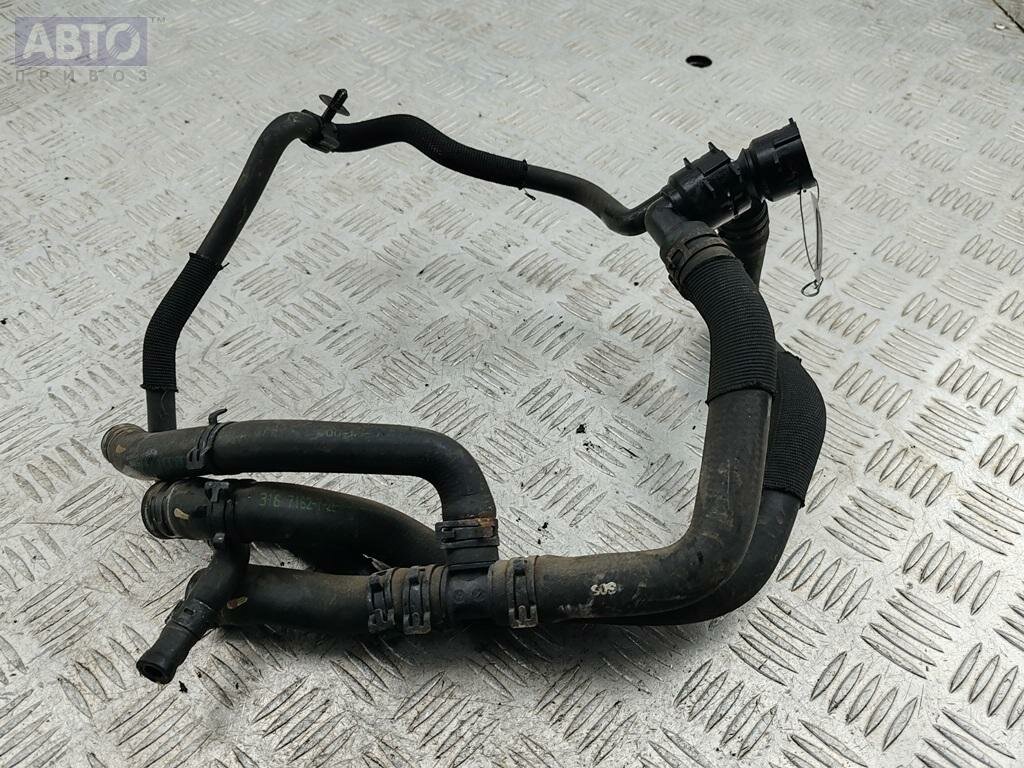 Патрубок отопителя (печки) Volkswagen Passat B6