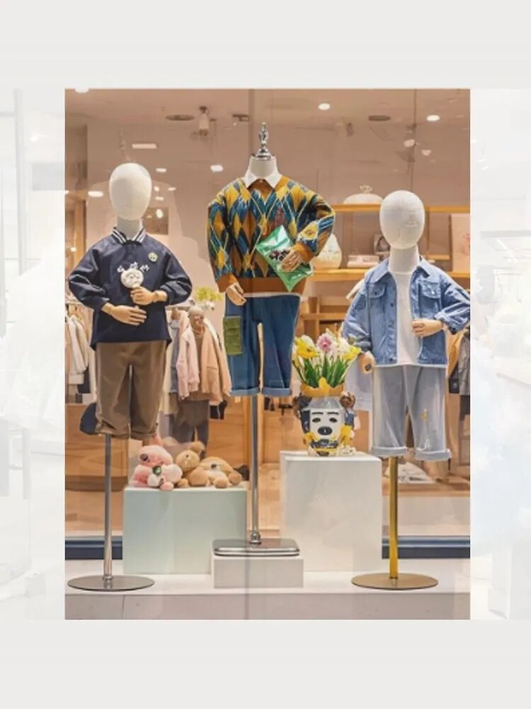 Детские манекены-половинки (витринные подставки для одежды), манекены для детской одежды (мальчиков и девочек), полуторсы для витрин магазинов.