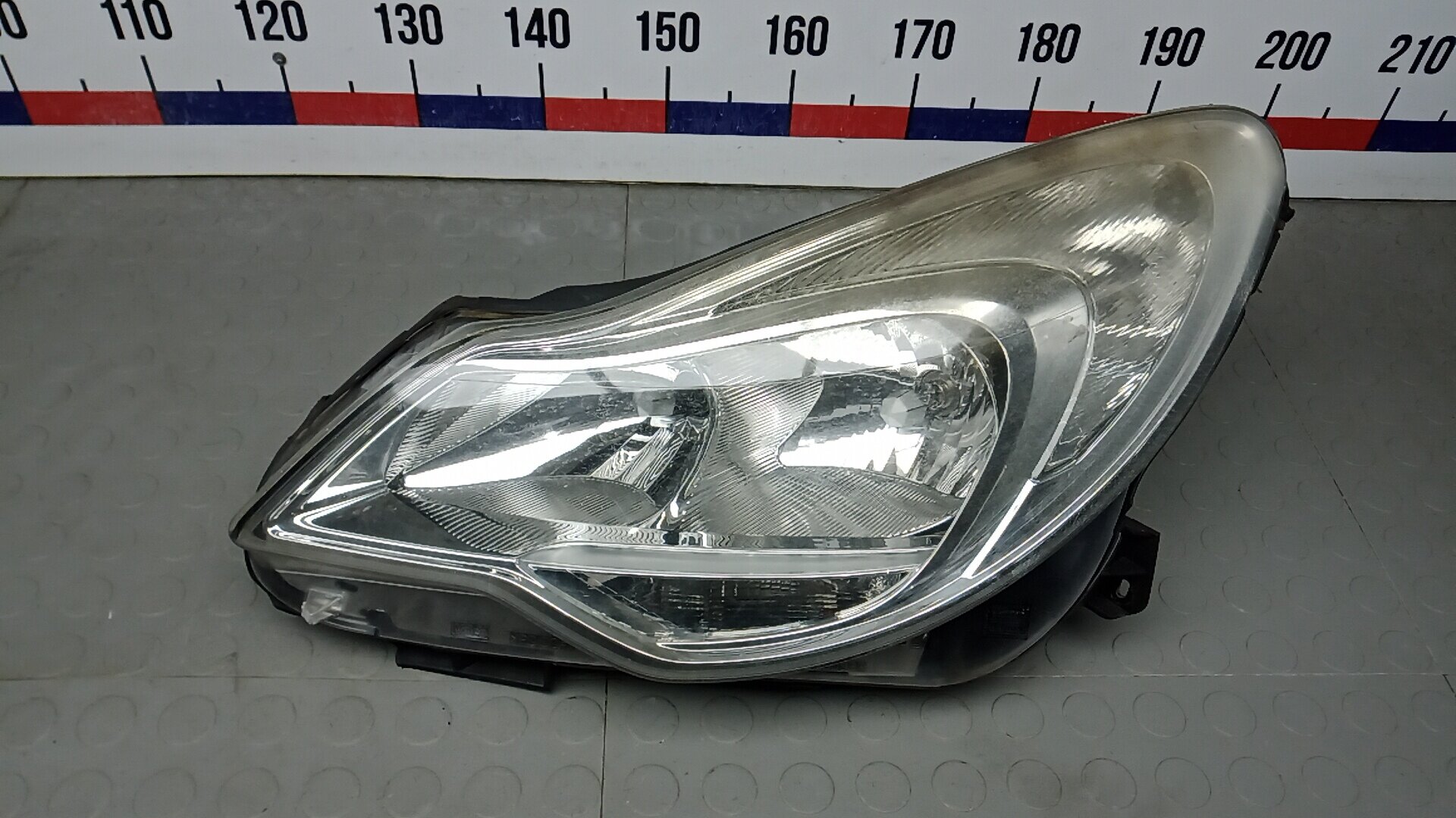 Фара левая OPEL CORSA D