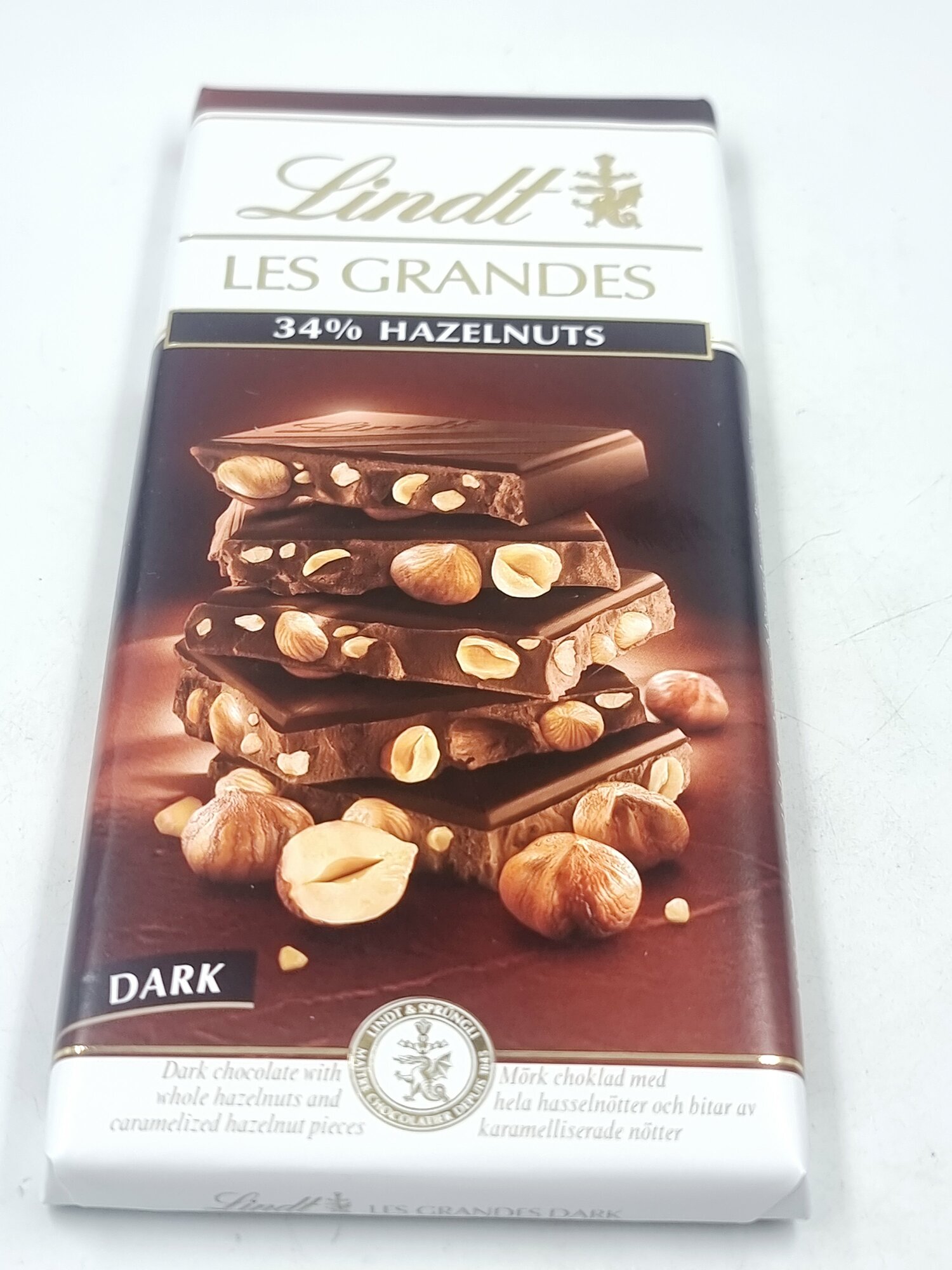 Lindt LES GRANDES Темный шоколад 34% с лесным орехом, 150 г (Швейцария)