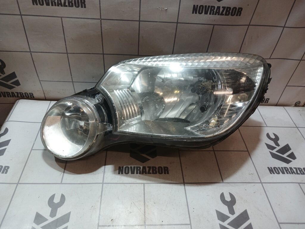 Фара левая Skoda Yeti 2009-2018