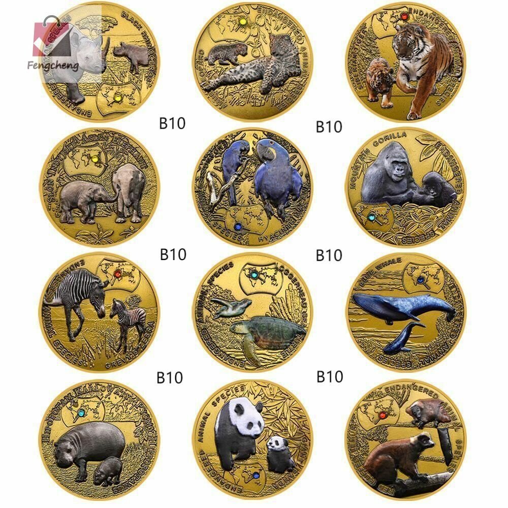 Замбийская памятная монета, посвященная исчезающим видам животных, набор из 12 коллекционных монет, золотого цвета.