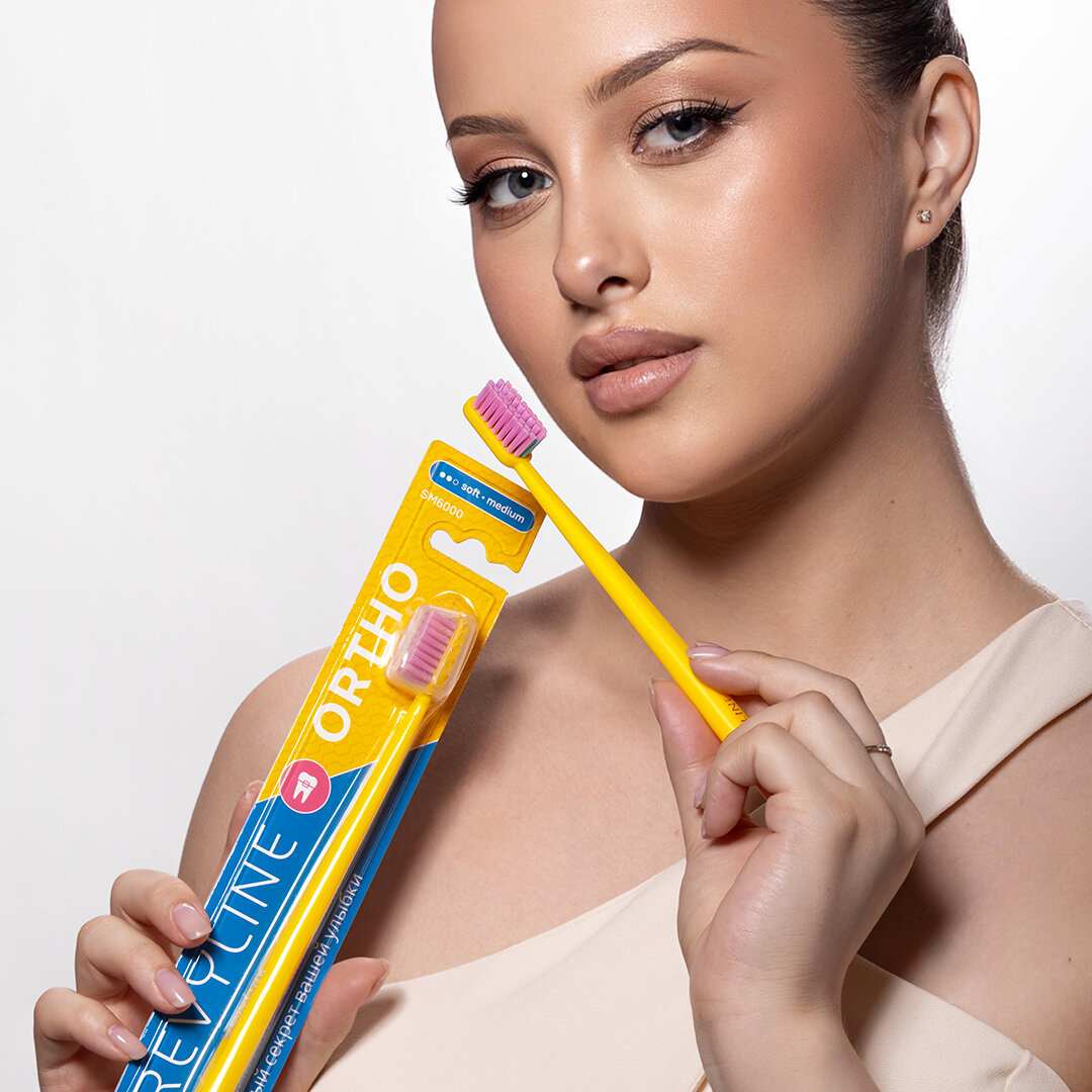 Revyline SM6000 Ortho зубная щётка, желтая с розовой/голубой щетиной