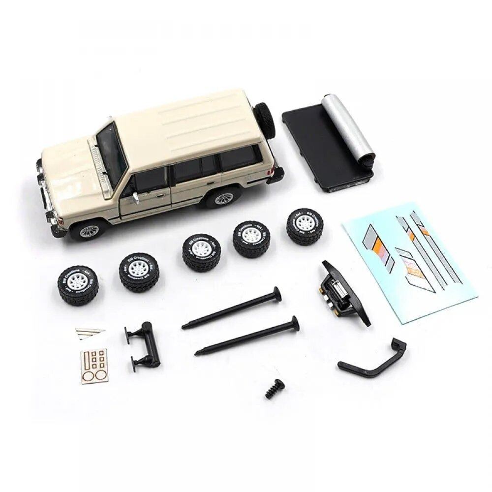 Машинка BM Creations 1/64 Mitsubishi 1st Gen Pajero 1983 Ivory w/ Stripe RHD Diecast Scale Model Car