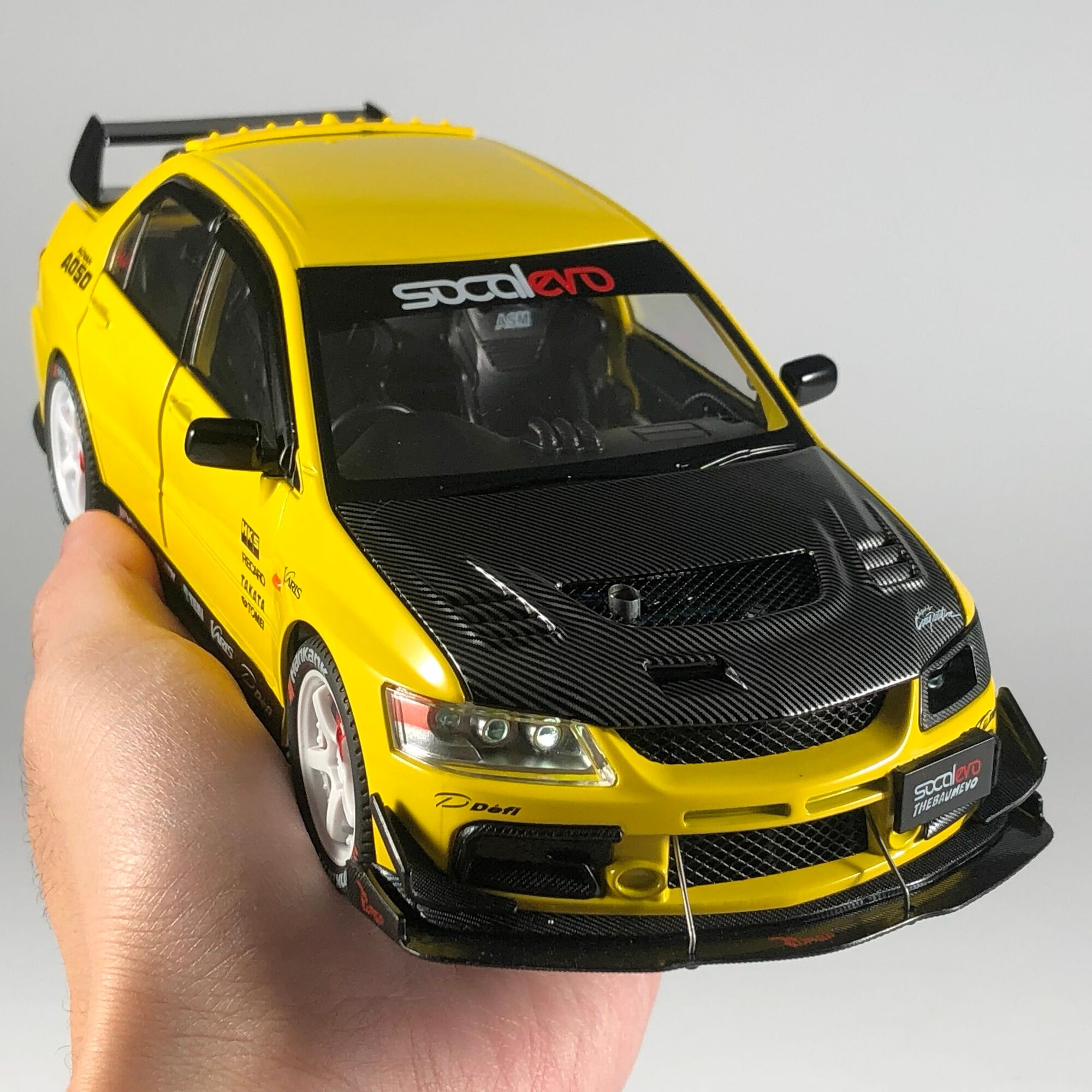 Мицубиси Lancer Evolution Девятое поколениеМодифицированная версия , 1:24 Mitsubishi Lancer Evolution EVO9 Modified version Уличные гонки, Коллекционные предметы, Со звуковыми и световыми эффектами