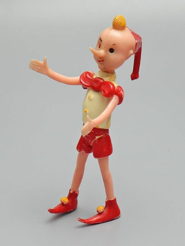 Антикварная детская игрушка на резинках "Буратино", колкий пластик, 1950-60 годы, СССР