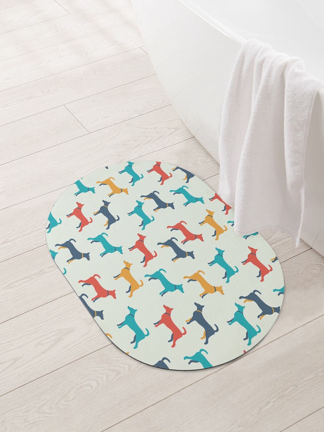 Коврик для ванной и туалета овальный противоскользящий JoyArty "Радужные собаки" 58x38 см
