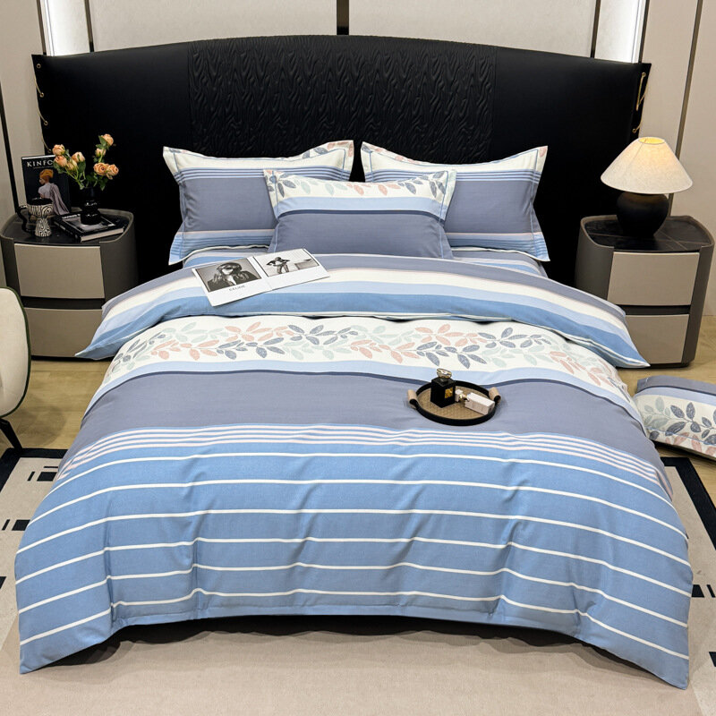 Осенне-зимний четырехпредметный комплект простого утепленного постельного белья из полиэстера и хлопка с принтованными простынями и пододеяльником от Nantong Home Textiles.