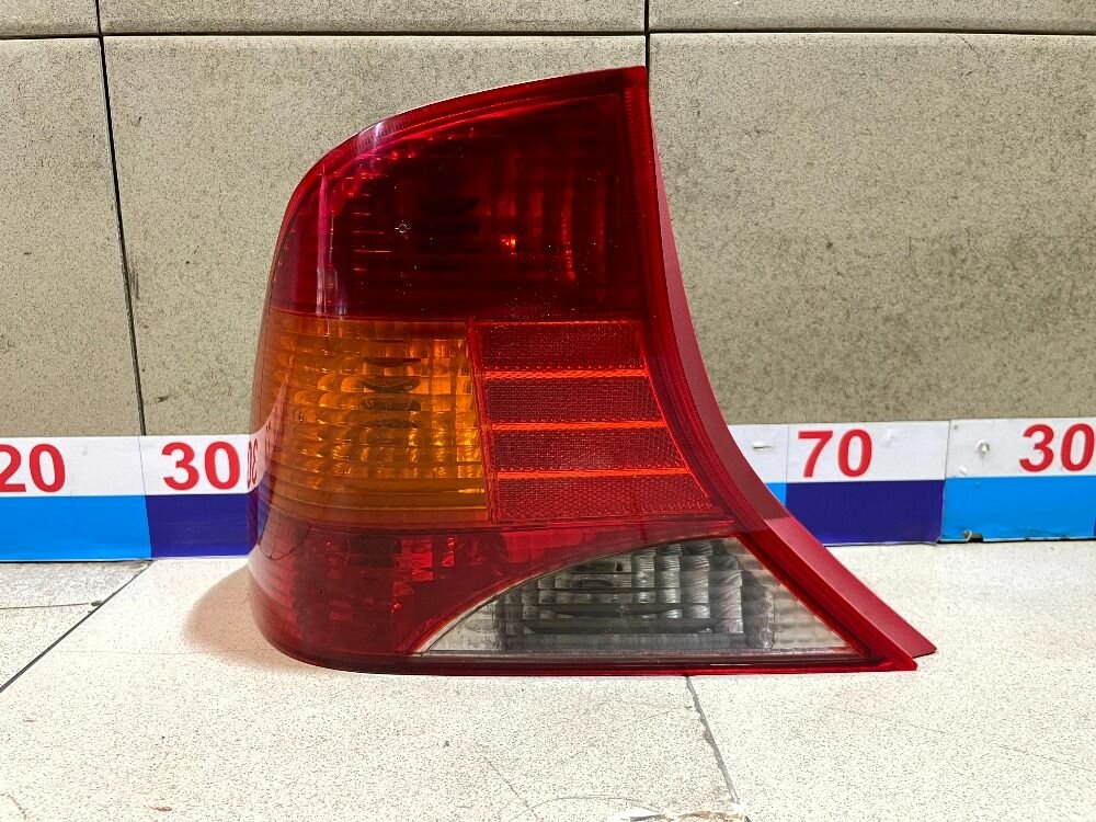 Фонарь задний левый Ford Focus I