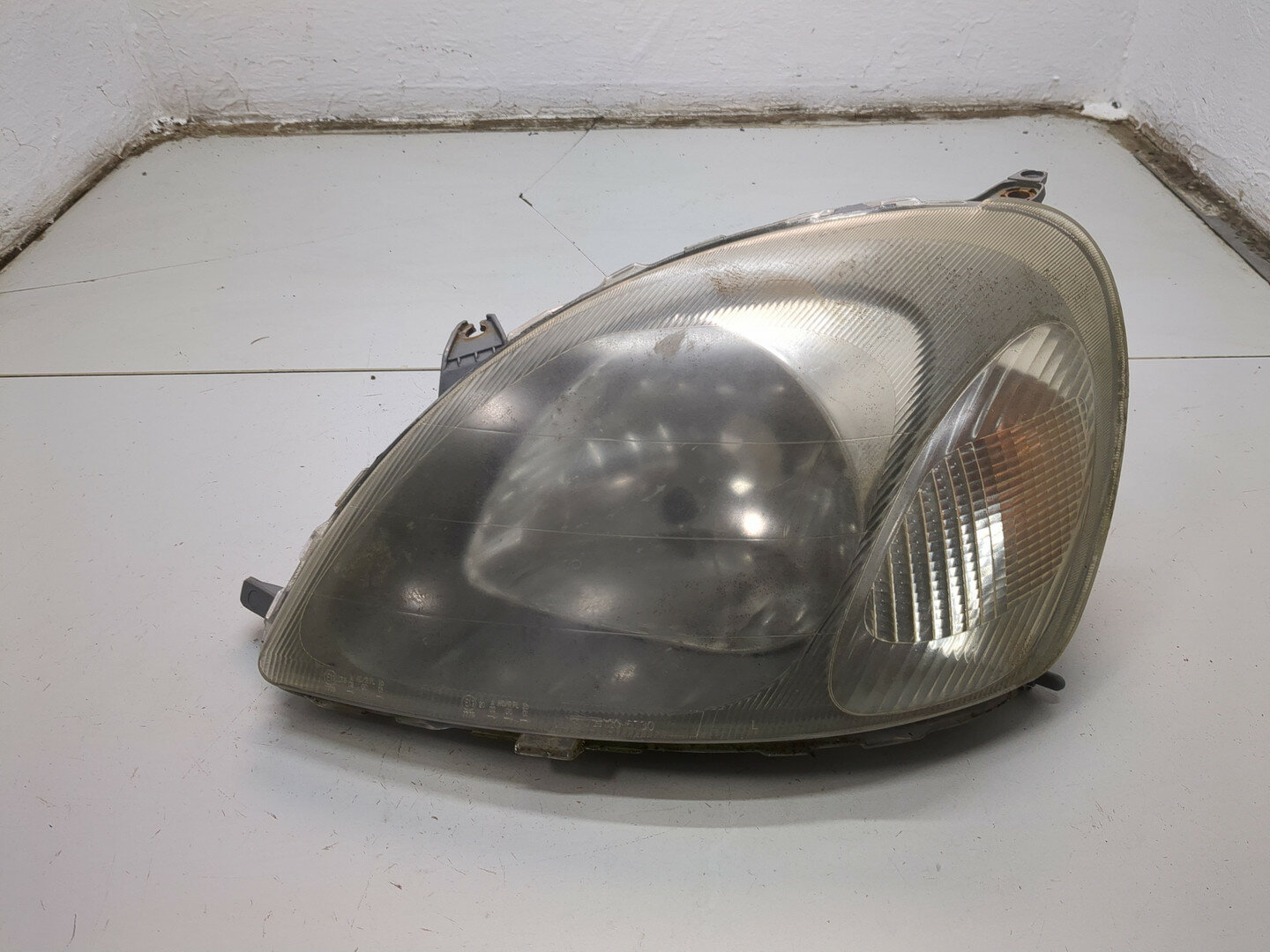 Фара (передняя) левая Toyota Yaris Б/У