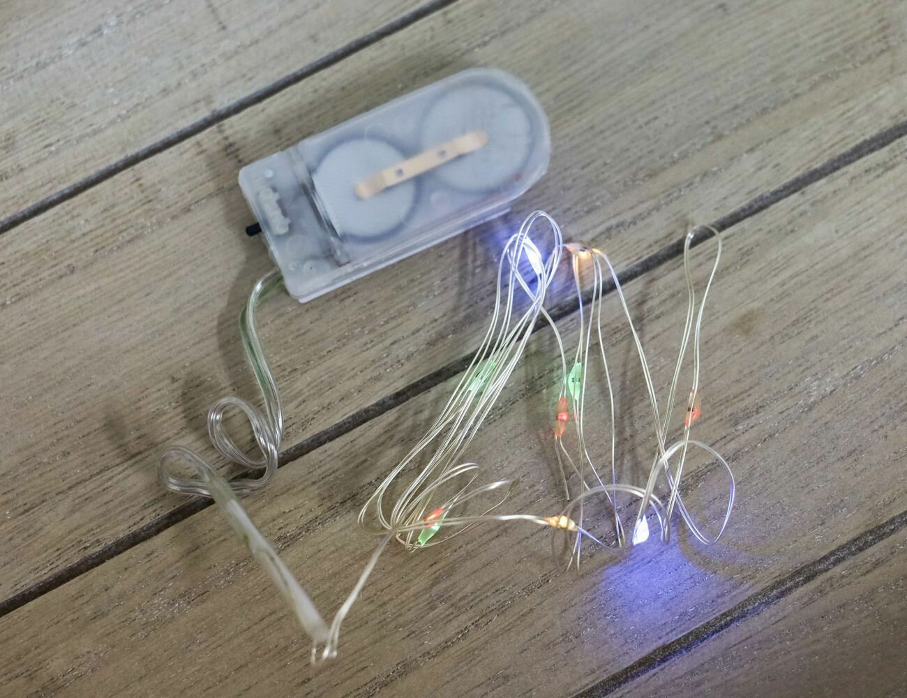 Гирлянда светлячки, 10 разноцветных мини LED-огней, 1 м, серебристый провод, батарейки, Купман Интернешнл (Koopman.