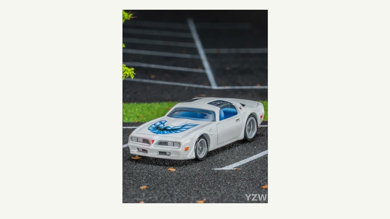 Hot Wheels Premium 77 Pontiac Firebird TA в масштабе 1:64 Игрушечная машинка — фото 1