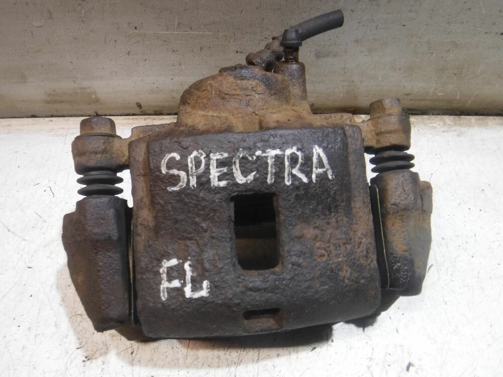 Суппорт передний левый Kia Spectra